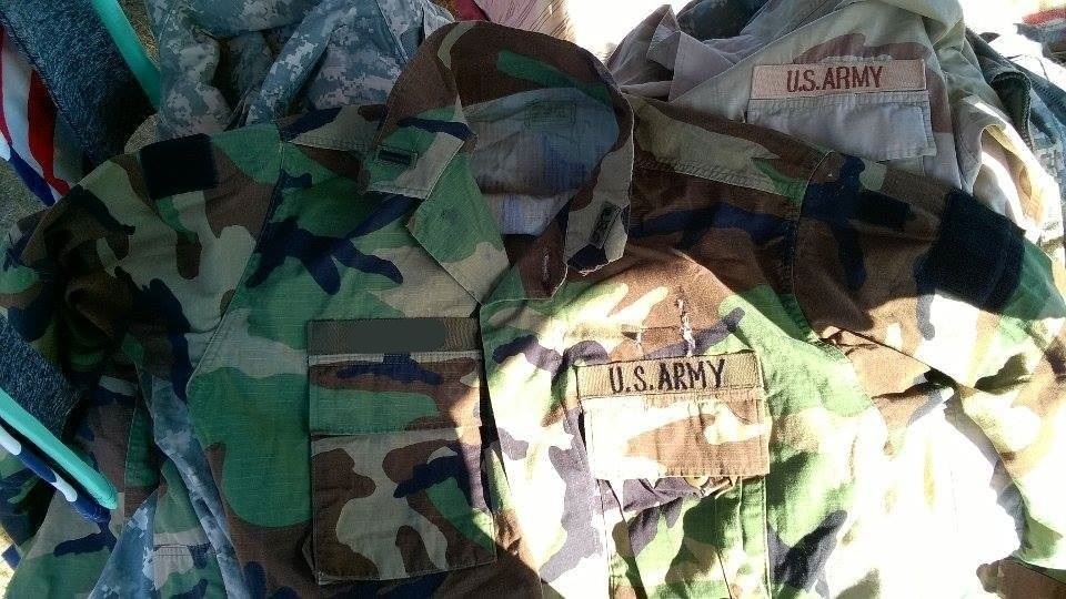 Modified BDU top with black velcro patches on both sleeves ...