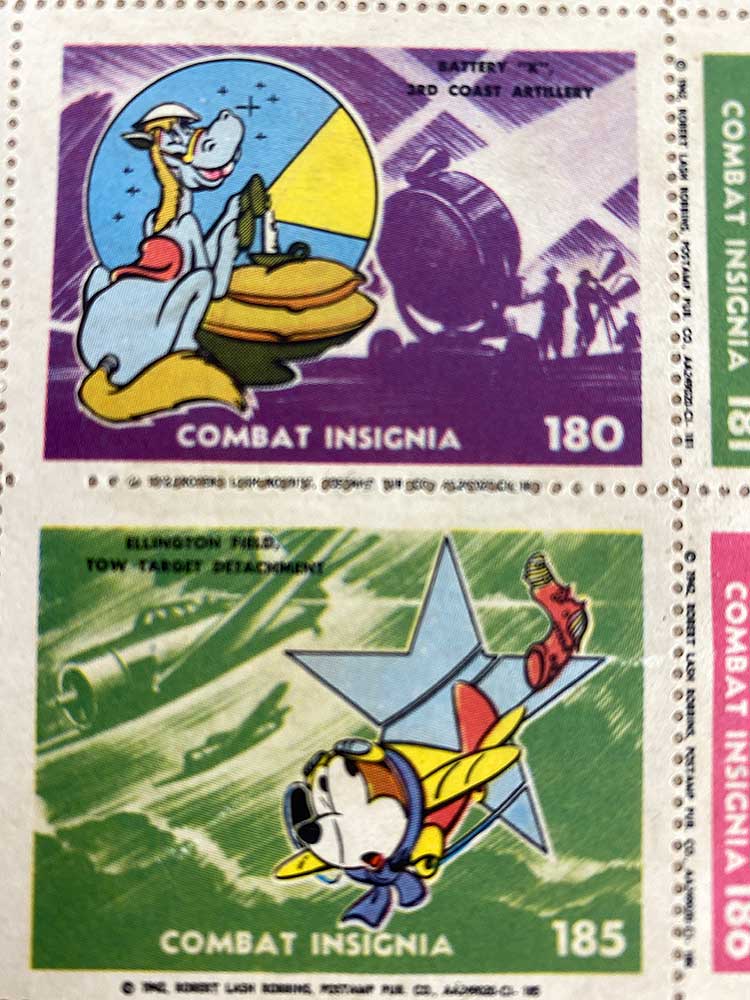 WWII Disney & Lantz etc patch designs in stamp album - WALT DISNEY GOES ...