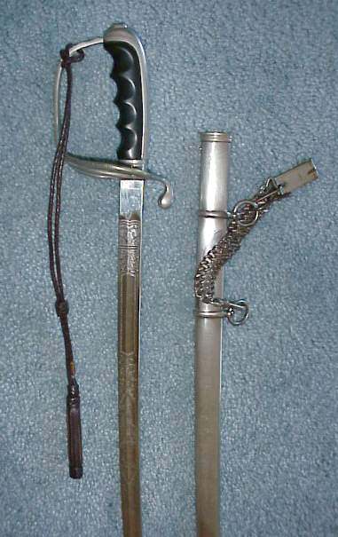 Early sword hanger for the M1902 Sabre - EDGED WEAPONS - U.S. Militaria ...