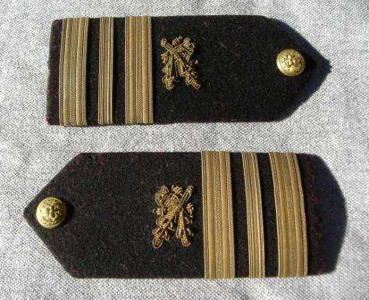 Need help with symbol on Navy shoulder boards. - NAVY, COAST GUARD AND ...