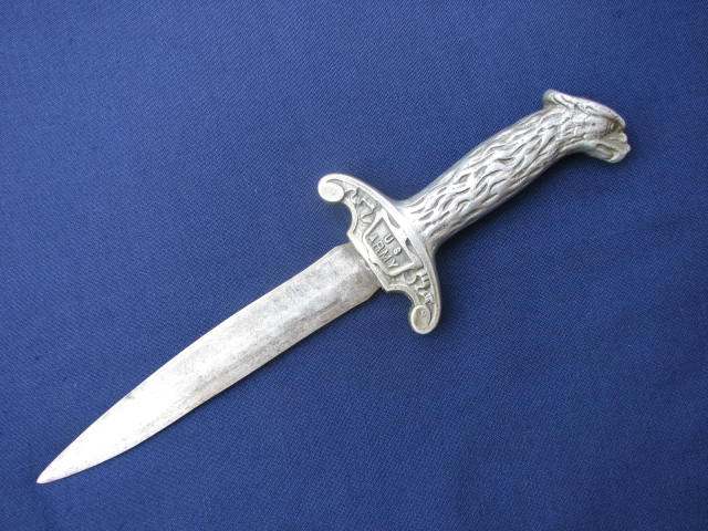 I'm looking for some information on this Knife possibly a Merrill E ...