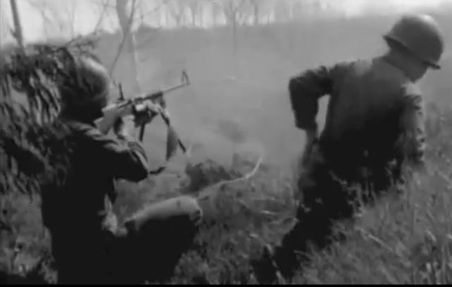 American GI using Johnson Light Machine Gun in combat... - EPHEMERA ...