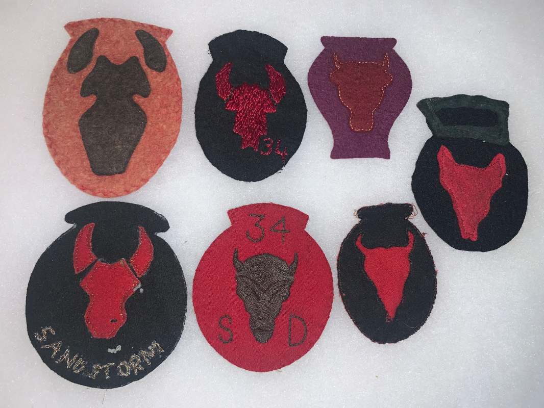 A years worth of 34th Division patches, and I didn't get them all ...