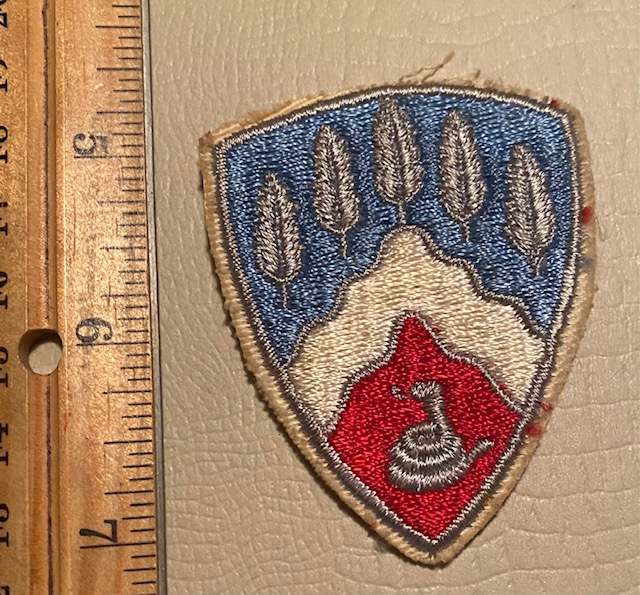 New patch but who is it for? Snake and feathers: 369th AAA Bn (1953) or ...