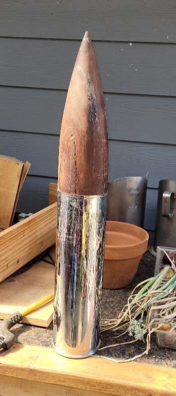 Interesting Man Cave item - what vintage is this 105MM shell ...