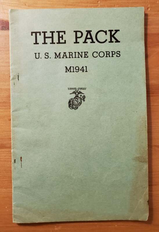 I need help with rolling up my WW2 USMC Camo Shelter half for the 782 ...