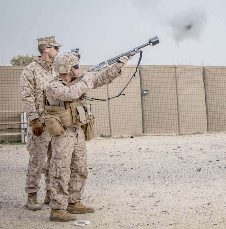What Device Is This Marine Using on His Mossberg M590A1 Shotgun? - ALL ...