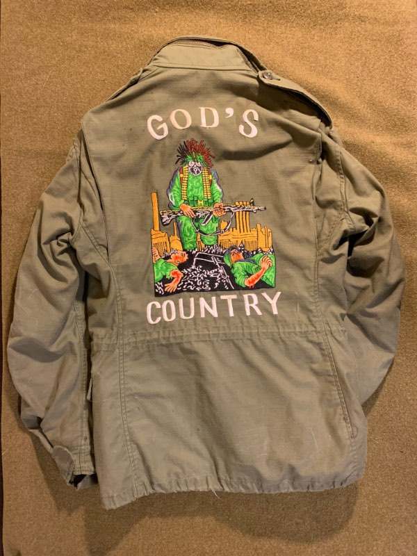 Garage sale pickup. Named M65 with comic book art embroidery ...