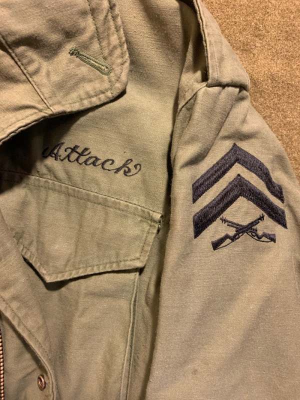 Garage sale pickup. Named M65 with comic book art embroidery ...