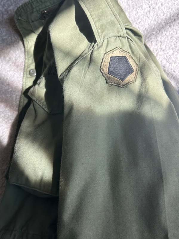 Is this a real patch? Octagon shape (point at top), black inverted ...