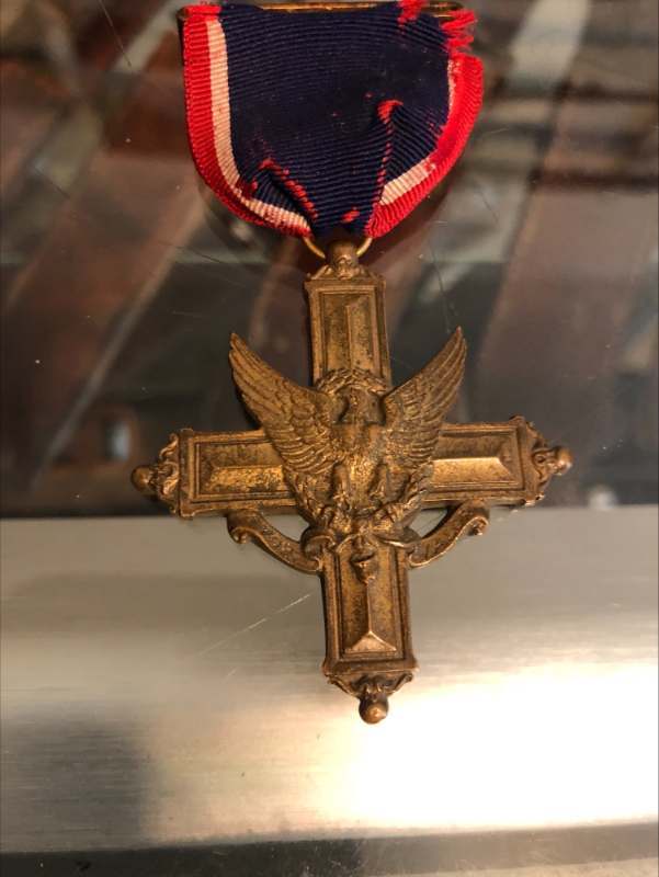 Authenticity and history of a numbered distinguished service cross ...